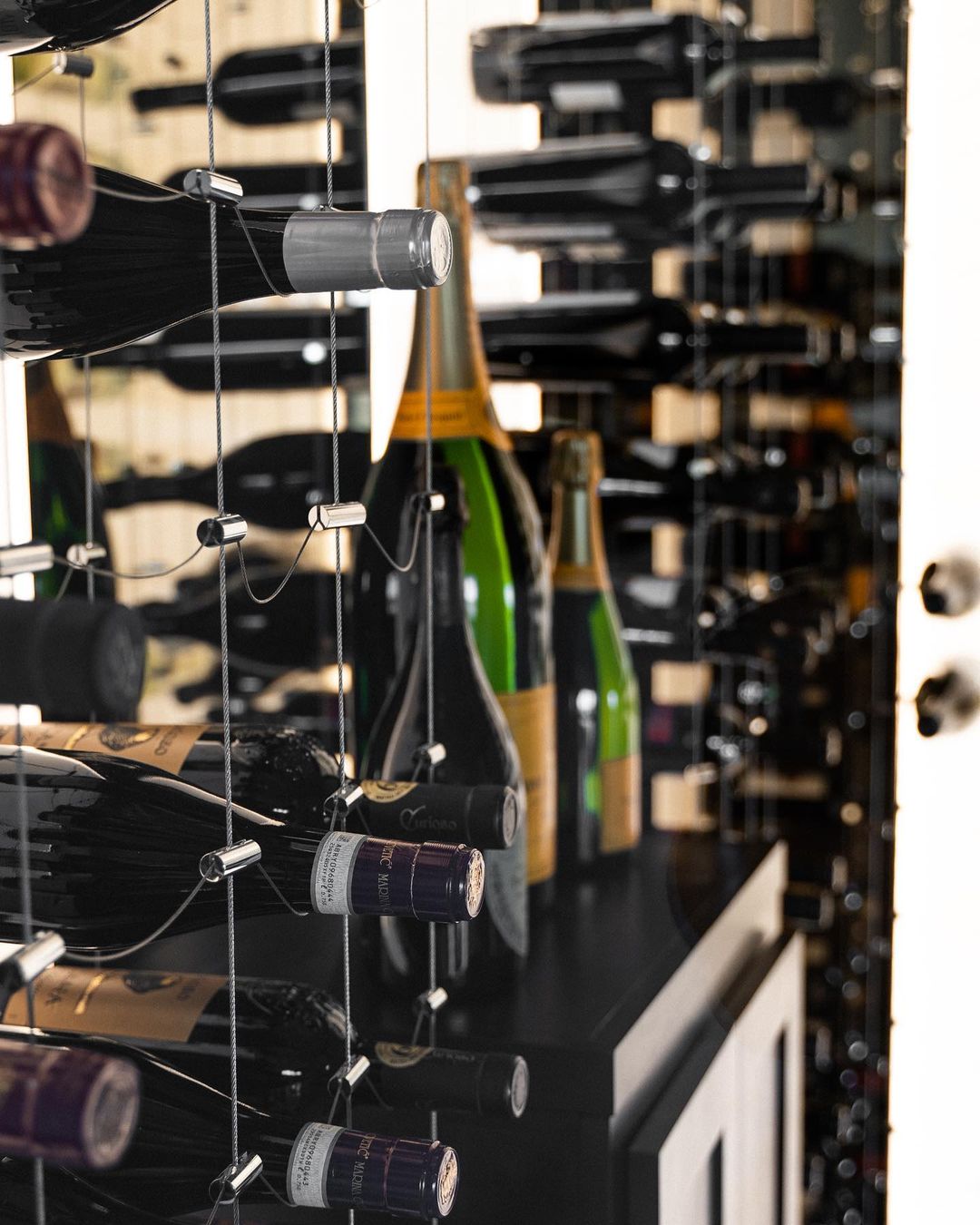 Elevate your wine display with our cable and glass wine racks. Create a ...